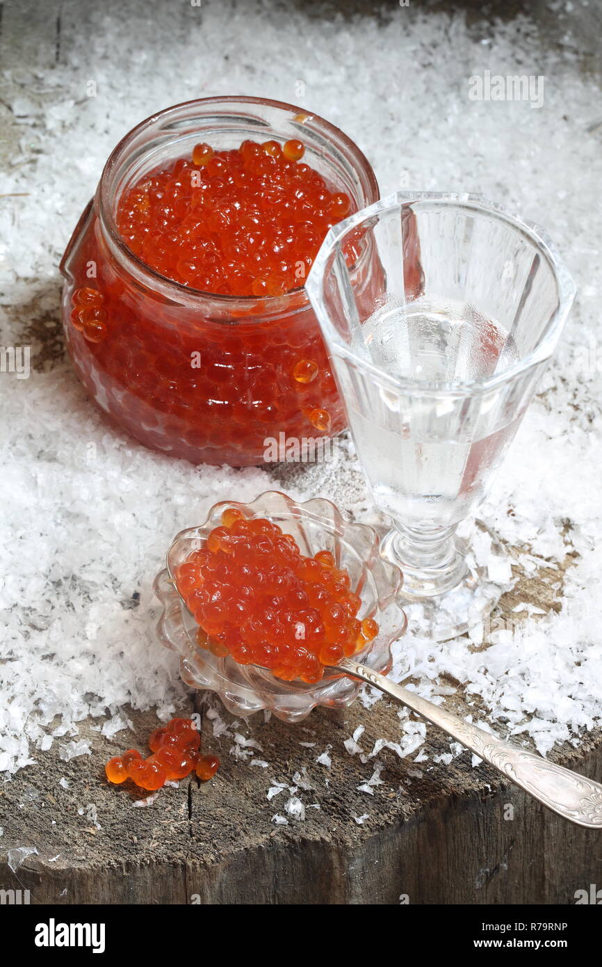 Still life with red caviar and vodka Stock Photo - Alamy