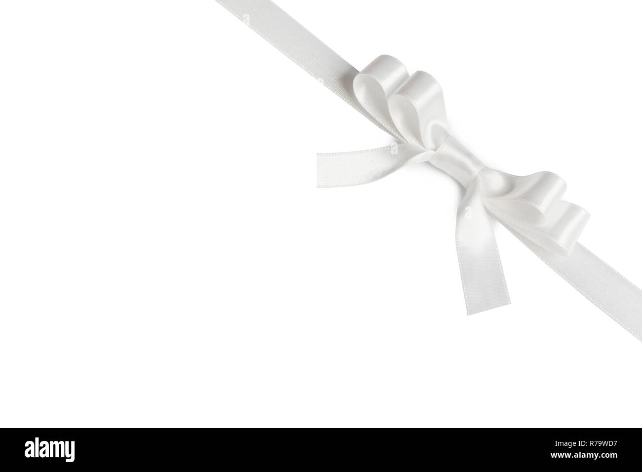 Shiny white satin ribbon and bow isolated on white background. Holiday ...