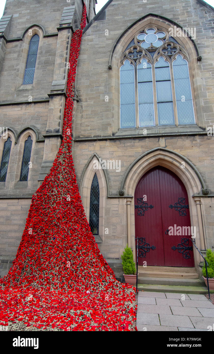 Knitted and crocheted poppy cascade on the Lawson Memorial Church ...