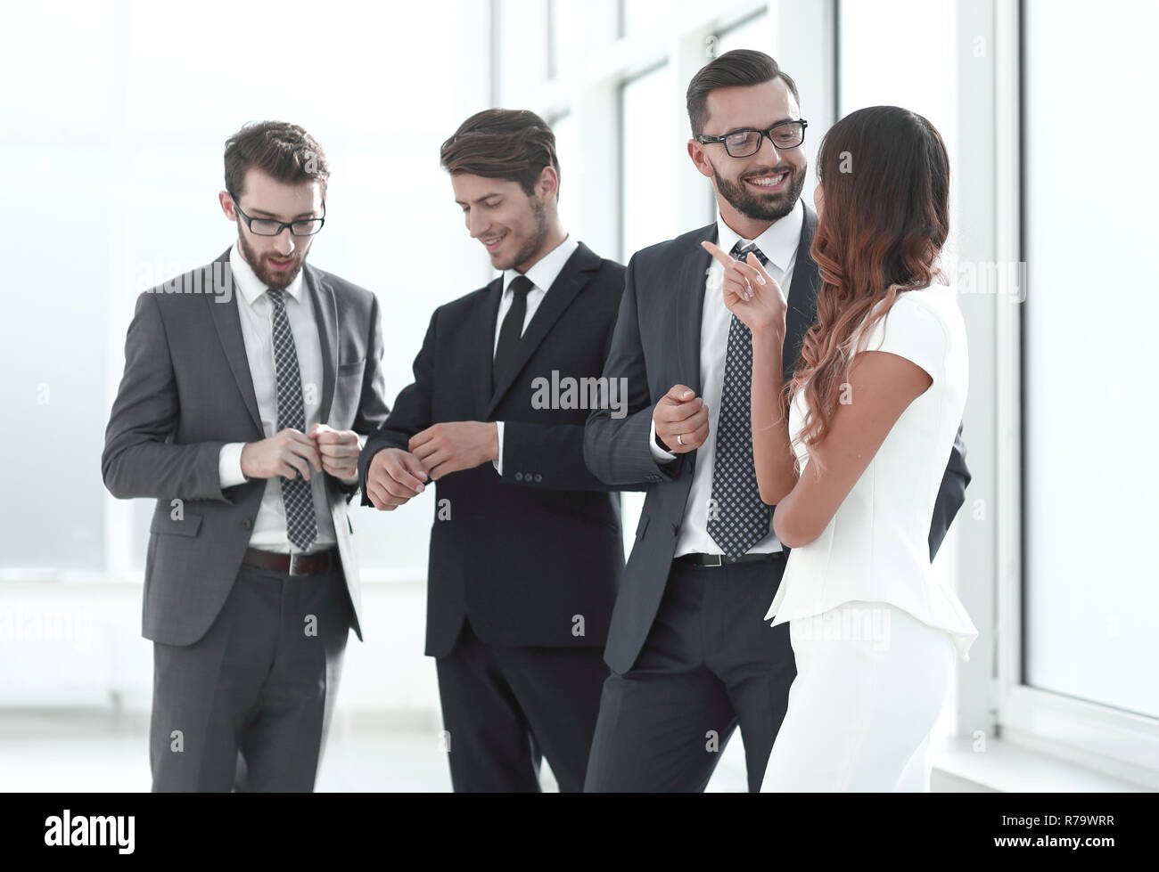 employees of the company standing in the office lobby Stock Photo - Alamy