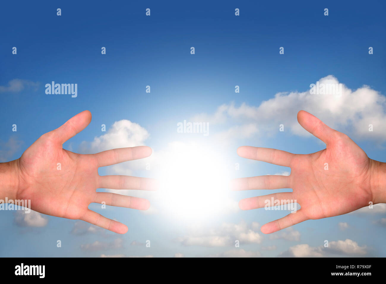 hands and sky Stock Photo - Alamy