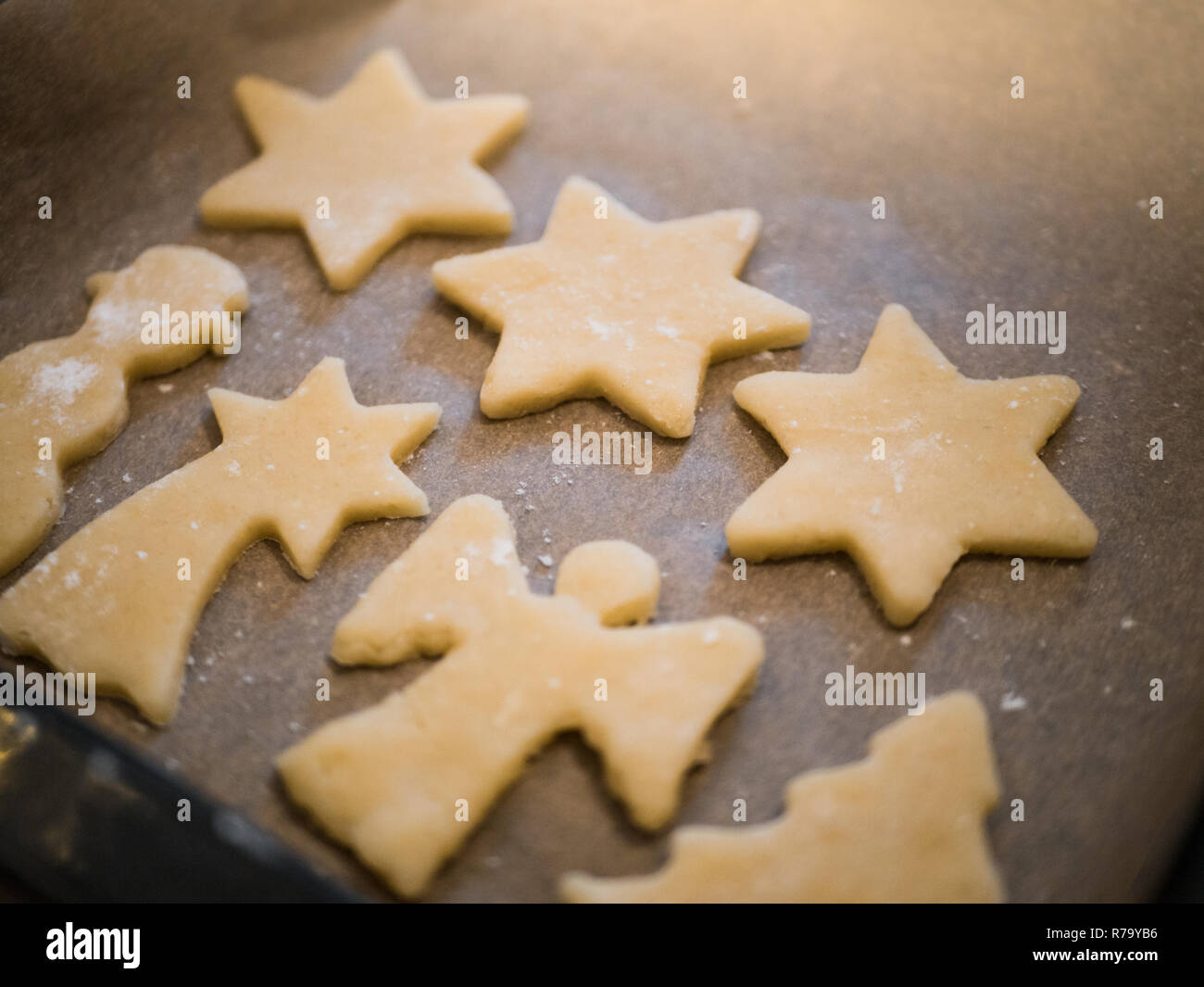 Christmas bakery: close-up of homemade cookies in angel, star and ...