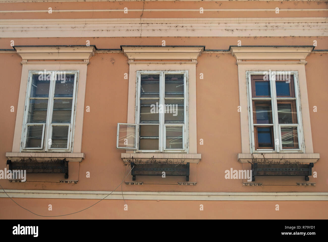 Windows on an old restored 19th century building Stock Photo - Alamy
