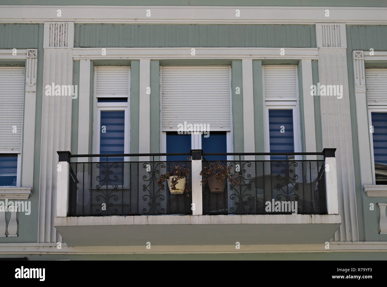 Modern building balcony with new windows and fence Stock Photo - Alamy