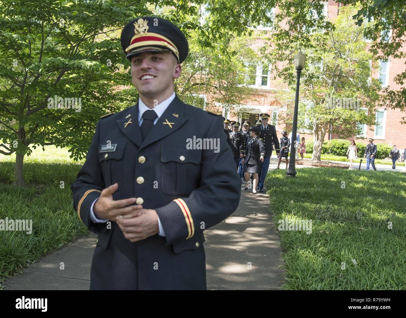 Brand new U.S. Army 2nd Lt. Allen Robertson walks across the Clemson ...