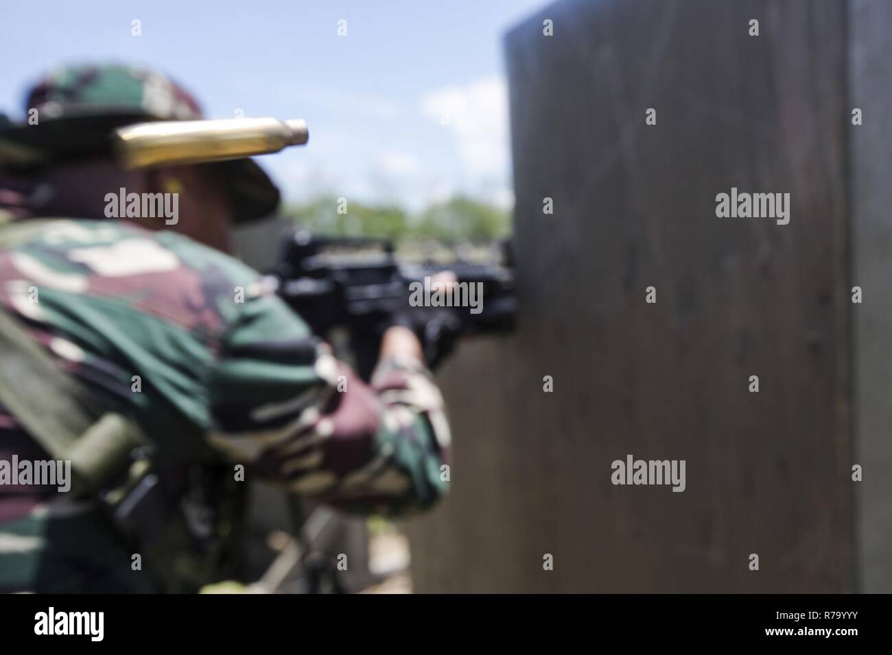 A Philippine Soldier, 84th Infantry Battalion, fires an M4 carbine ...