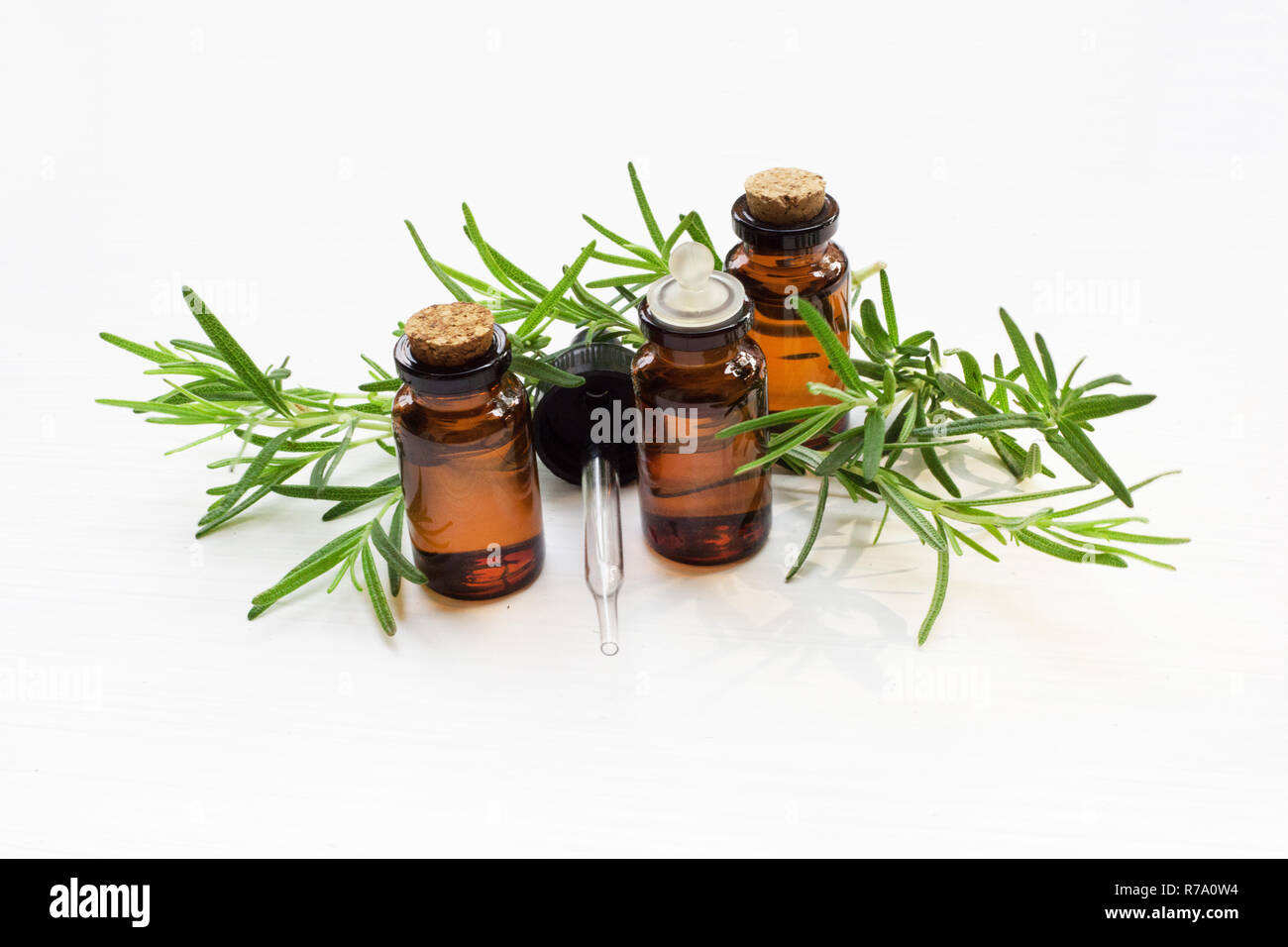 Bottles aromatic essential oil Cut Out Stock Images & Pictures - Alamy