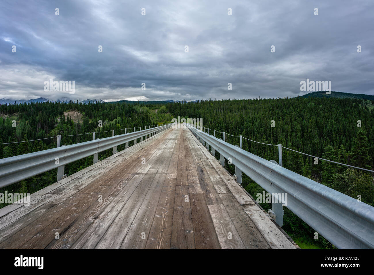 Bridge over Kuskulana river under the clouds, Alaska Stock Photo - Alamy