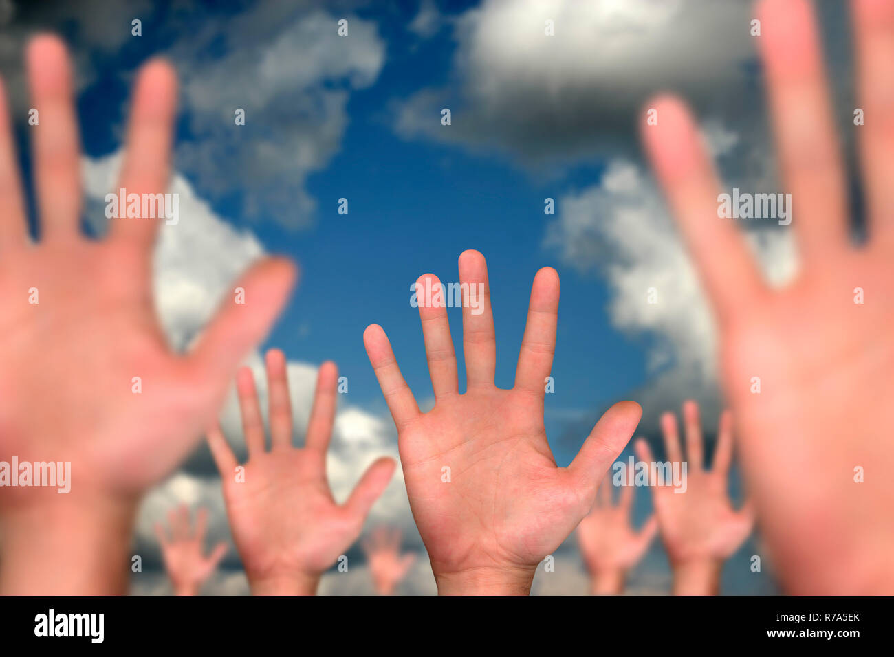 Overlapping hands hi-res stock photography and images - Alamy