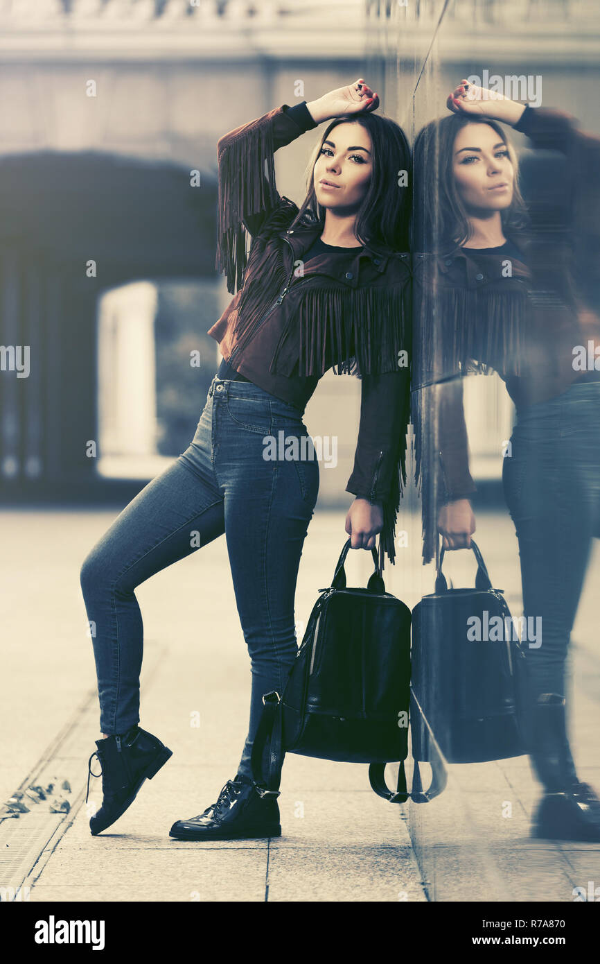 Female model leaning on wall hi-res stock photography and images - Alamy