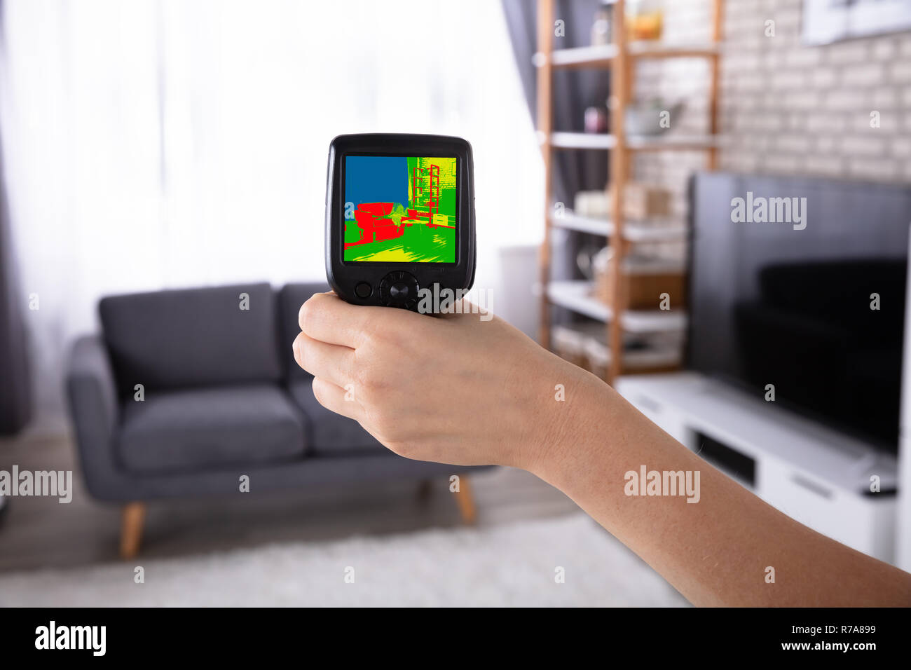 Woman's Hand Using Infrared Thermal Camera To Check Temperature In ...