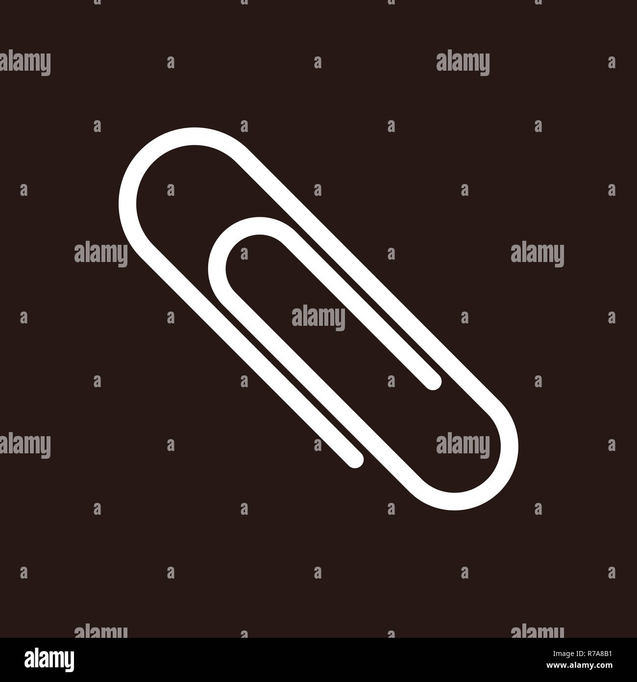 Paperclip icon on dark background Stock Photo - Alamy