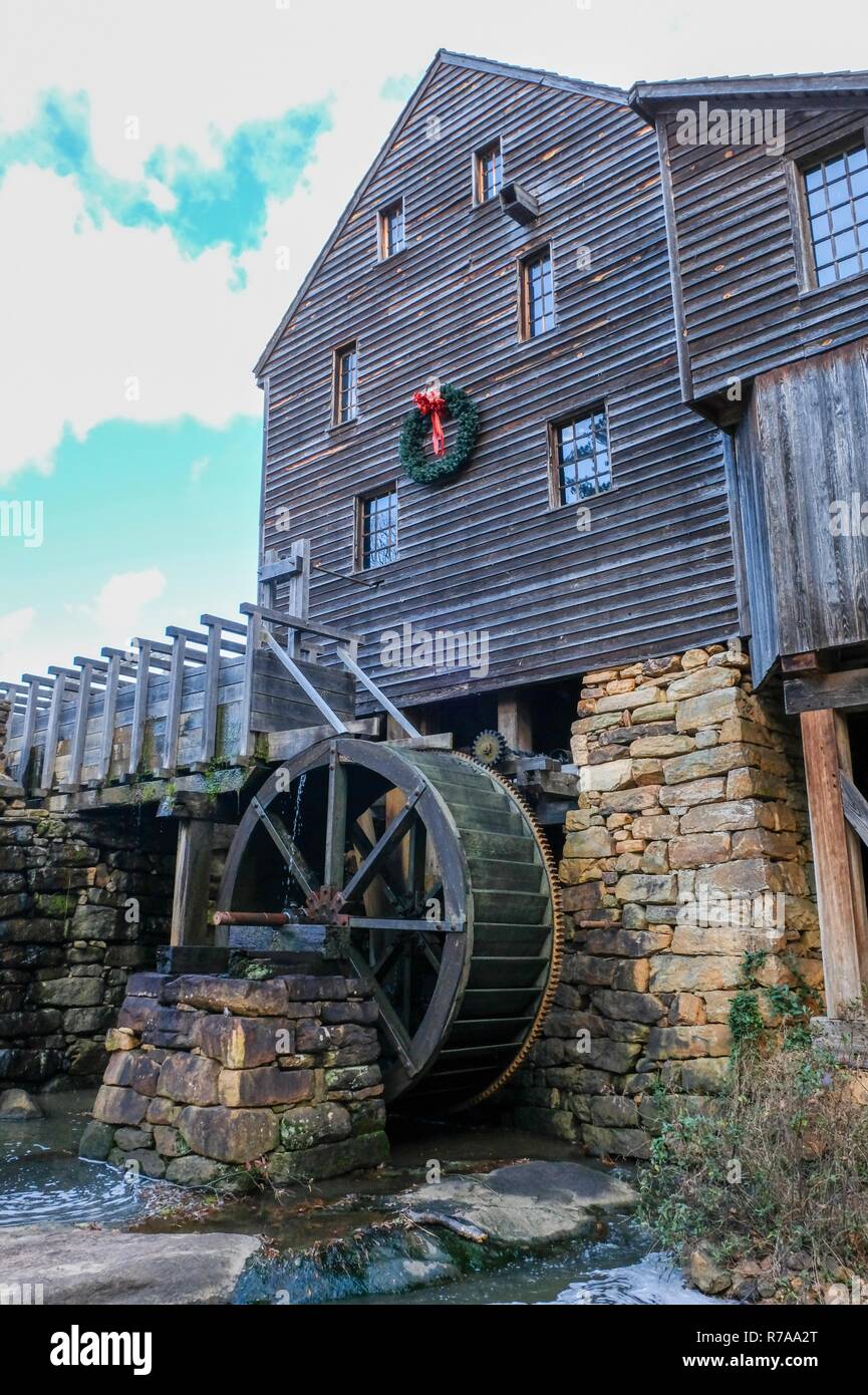 Old watermill decorated with a holiday wreath for Christmas at Historic ...