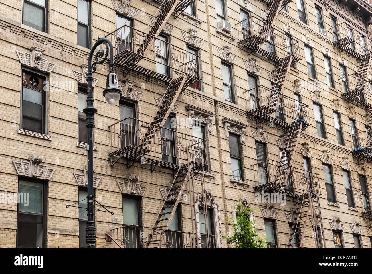 A fire escape of an apartment building in New York city Stock Photo - Alamy