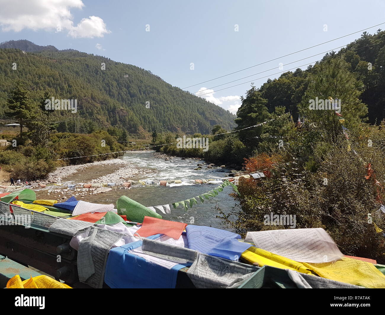 Paro, Bhutan. 17th Oct, 2018. Prayer flags and power lines cross a ...