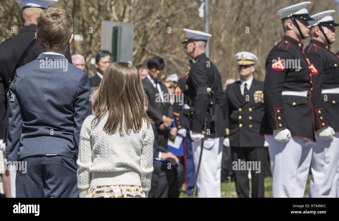 Family members of retired Lt. Gen. Lawrence F. Snowden attend his ...