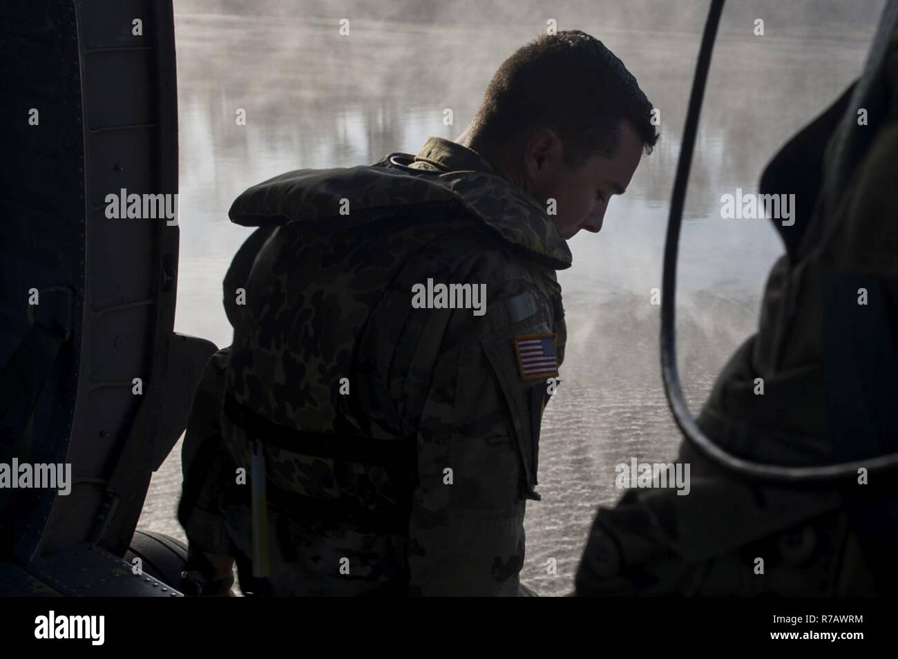 U.S. Army 1st Lt. Jonathan Reimer, 1st Armored Division, jumps from a ...