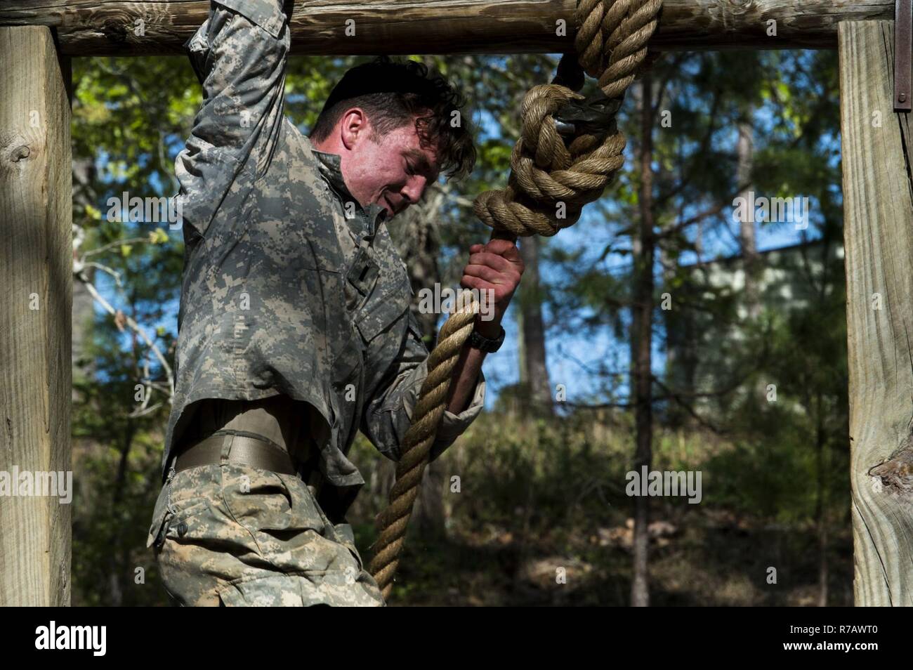 U.S. Army 1st. Lt. Daniel Strickland, 25th Infantry Division, grasps a ...