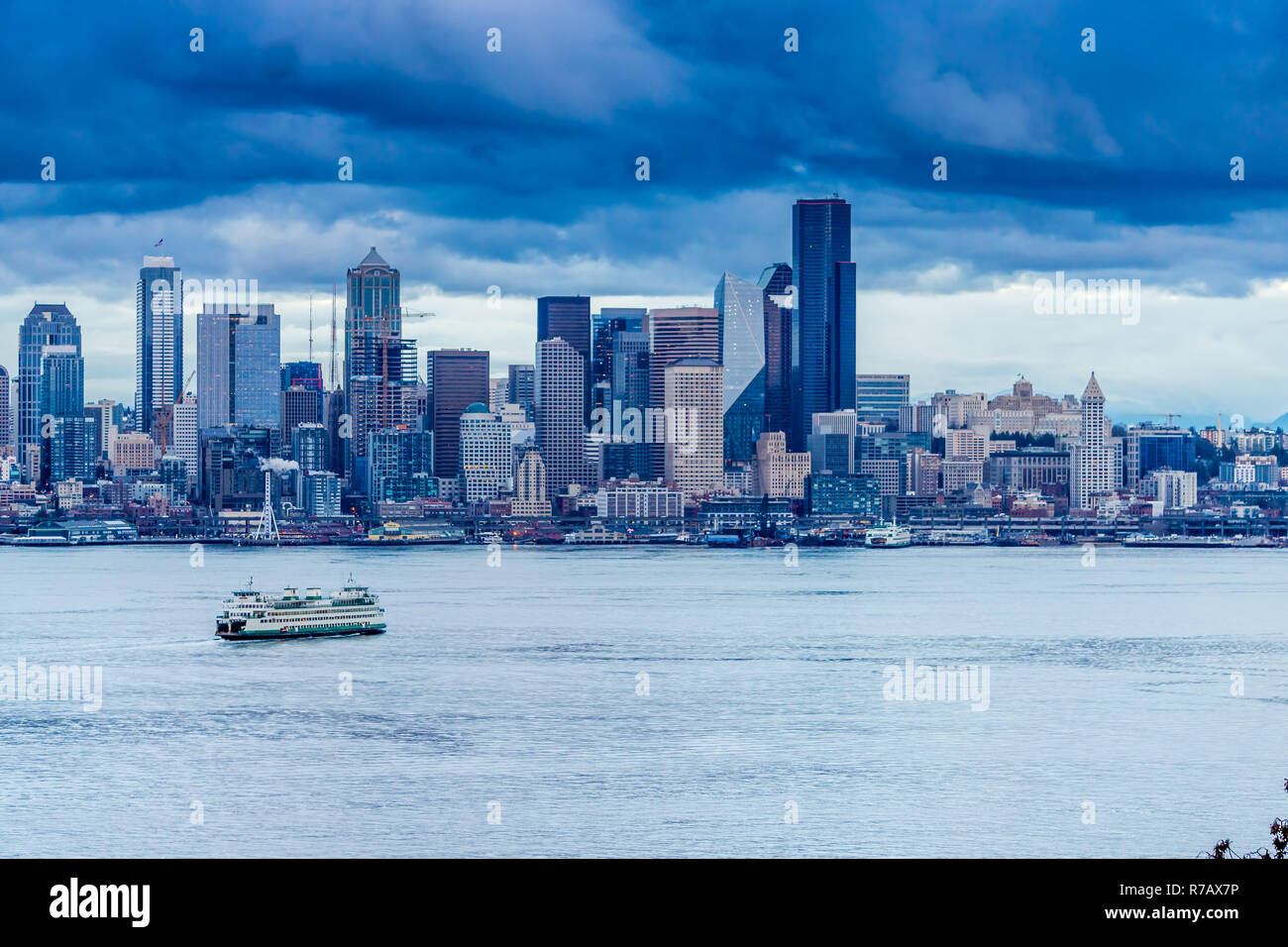 A view of the Seattle skyline with dark clouds overhead Stock Photo - Alamy