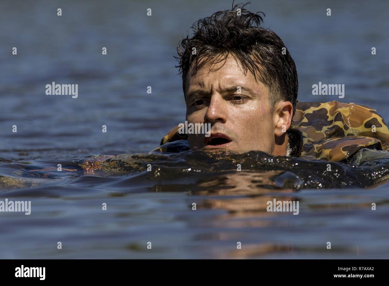 A U.S. Army Ranger swims ashore to perform the Combat Water Survival Assessment during the 34th ...