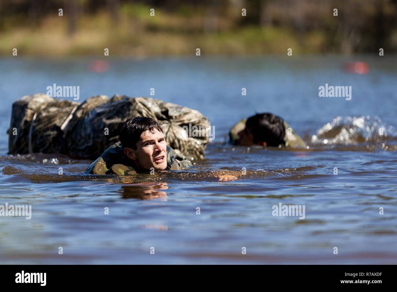 U.S. Army Rangers swim to shore during the Best Ranger Competition 2017 ...