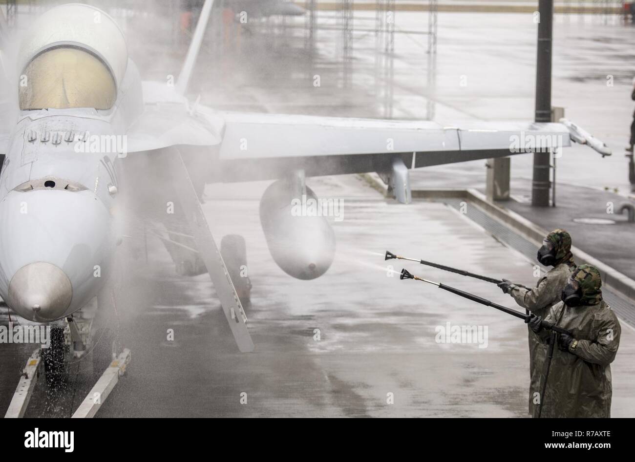 U.S. Marines conduct aircraft decontamination with Marine Fighter ...