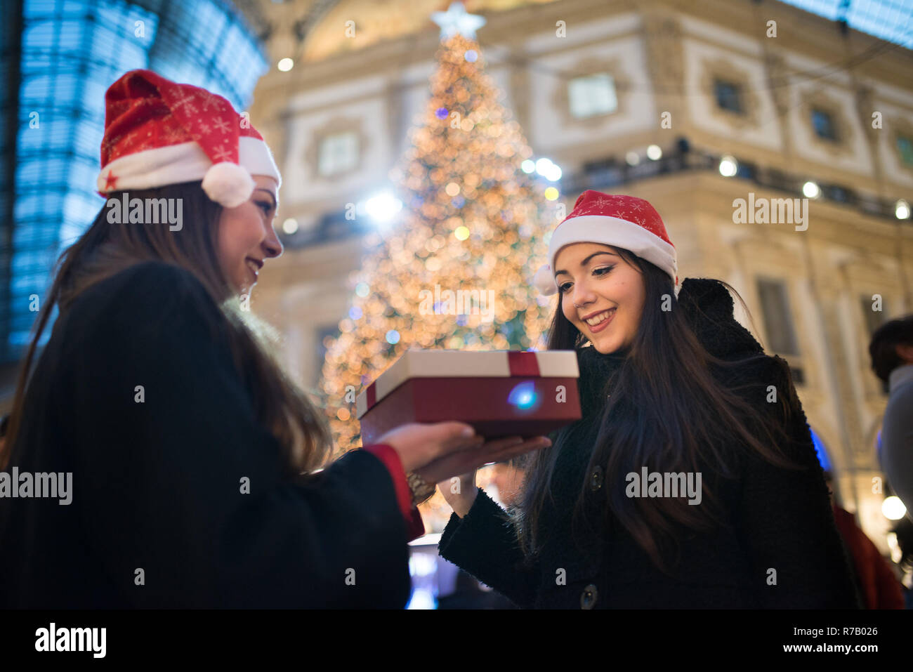Two women exchanging present hi-res stock photography and images - Alamy