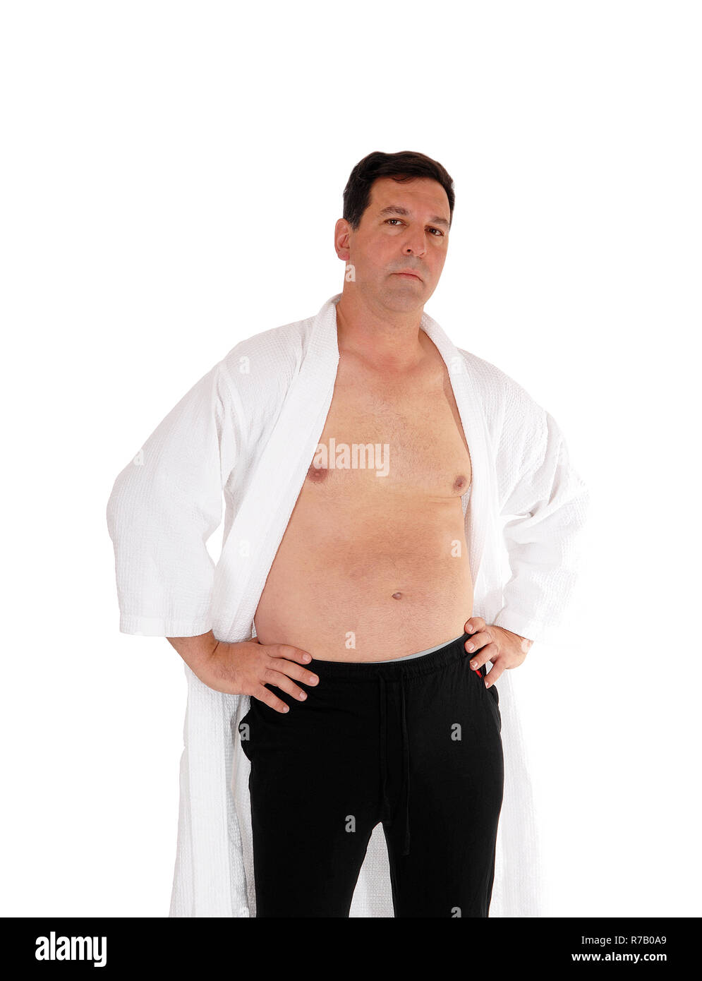 Man standing in bathrobe shirtless Stock Photo - Alamy