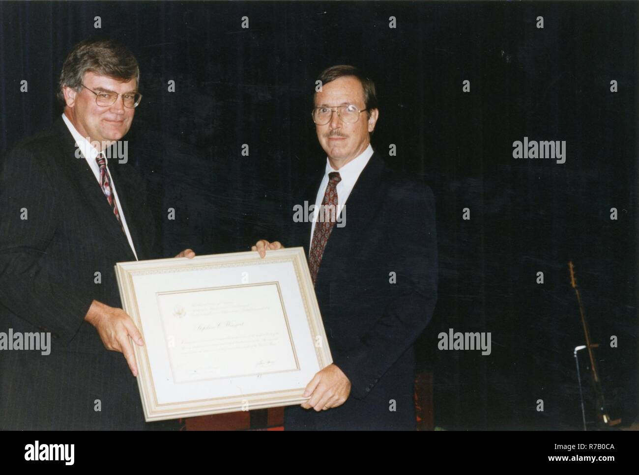 Admin. Atwood Honors-Ceremony USAID - Man receiving award on stage ...