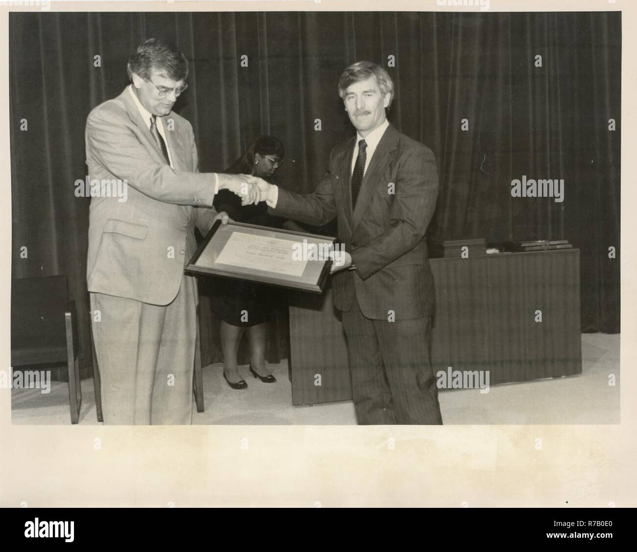 Admin. Atwood Honors-Ceremony USAID - Man receiving award on stage ...