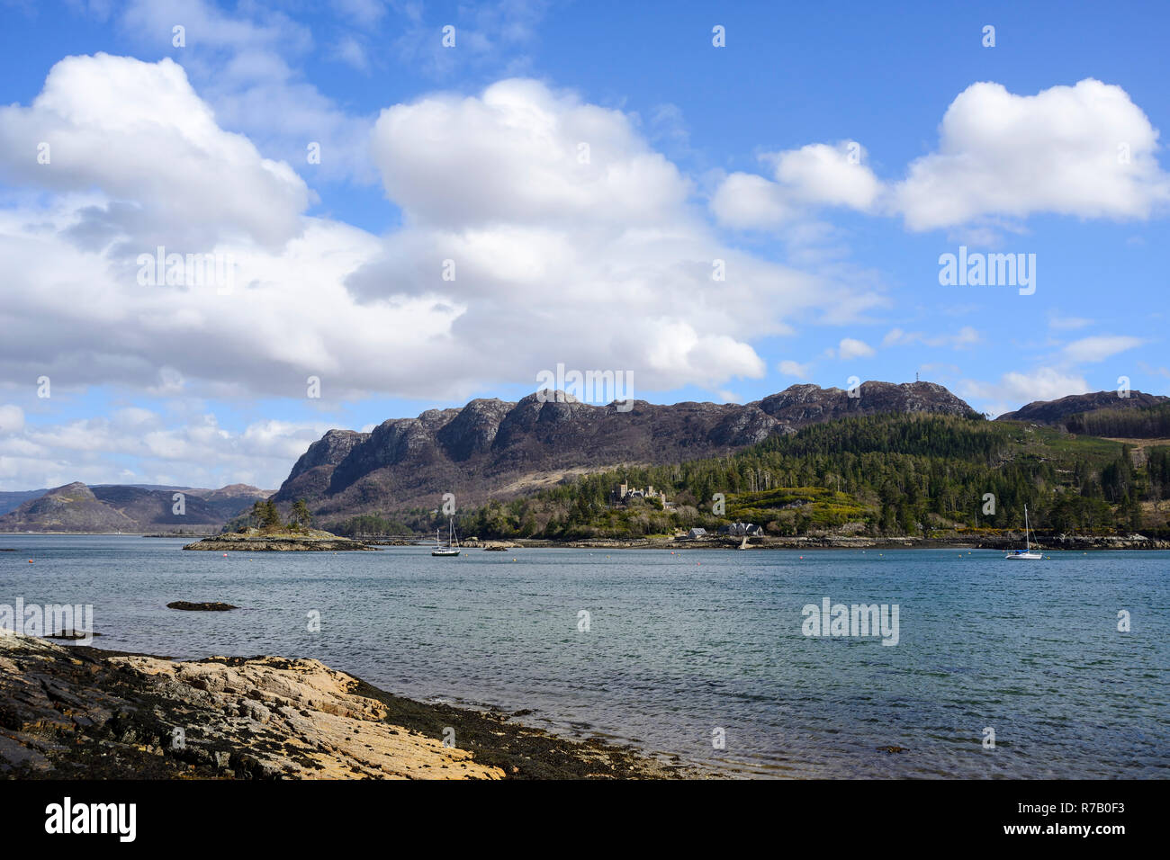 View across Loch Carron to Duncraig Castle and distant crags from ...