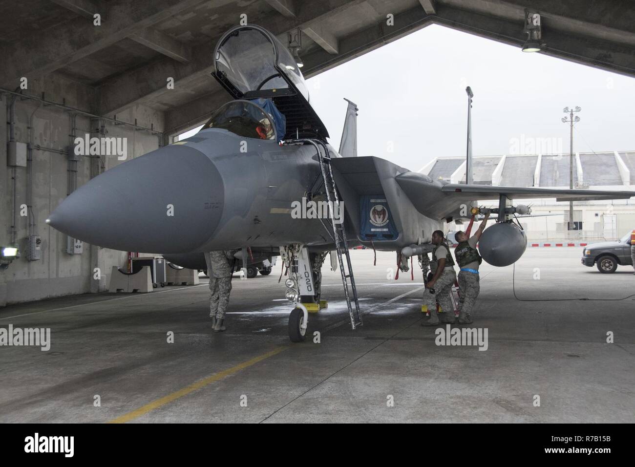 U.S. Air Force 44th Aircraft Maintenance Unit weapons load crew members ...