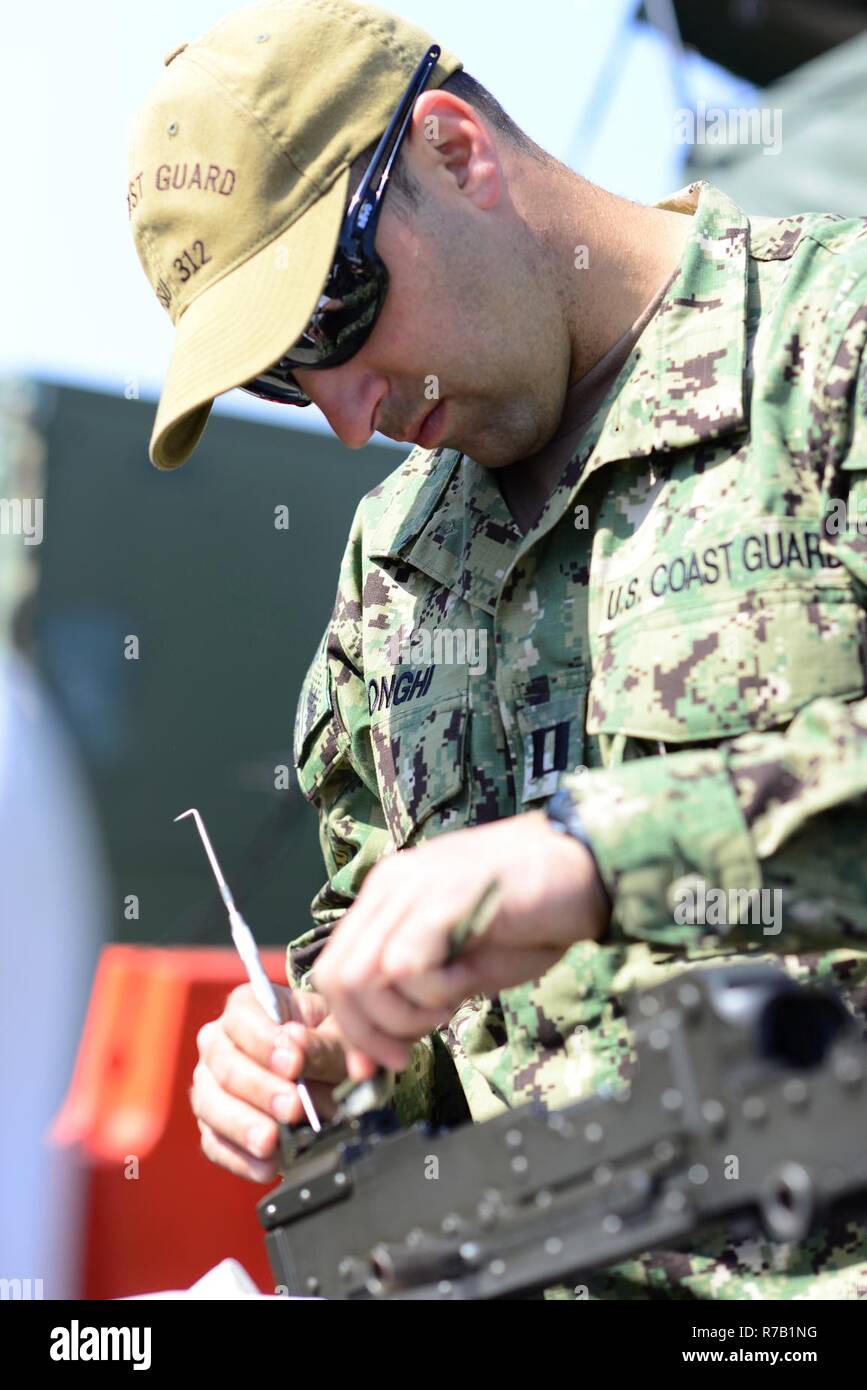 U.S. Coast Guard Lt. Mark Longhi, from Coast Guard Port Security Unit ...