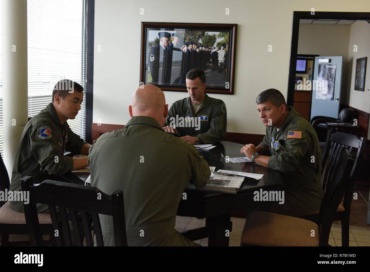 U.S. Air Force Maj. Gen. D. Todd Kelly (right) plans out details for ...