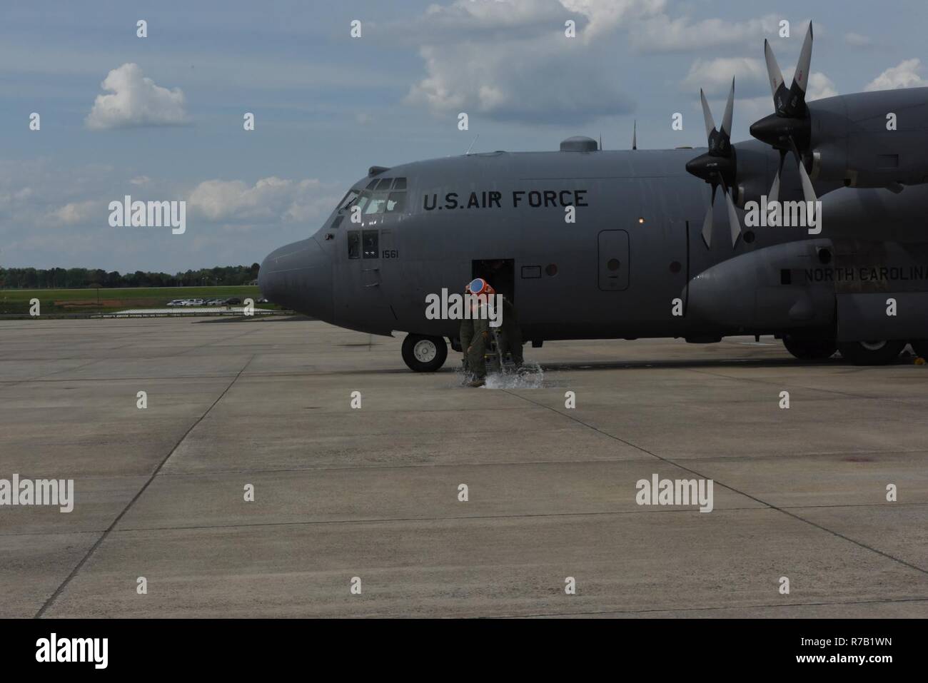 U.S. Air Force Maj. Gen. D. Todd Kelly is drenched in water by the ...