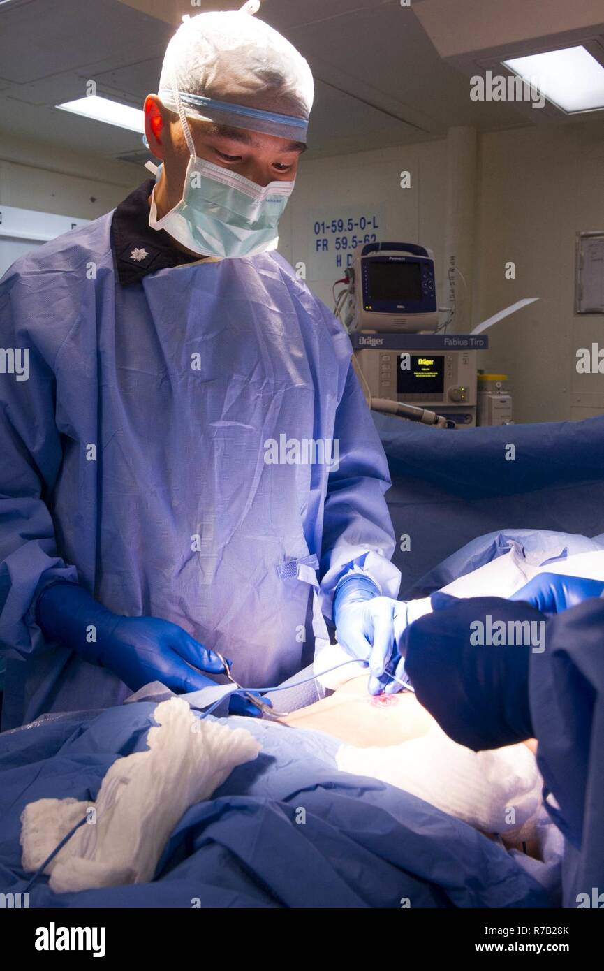 PACIFIC OCEAN (April 11, 2017) Cmdr. Jeffery Ciao, a surgeon for Fleet ...