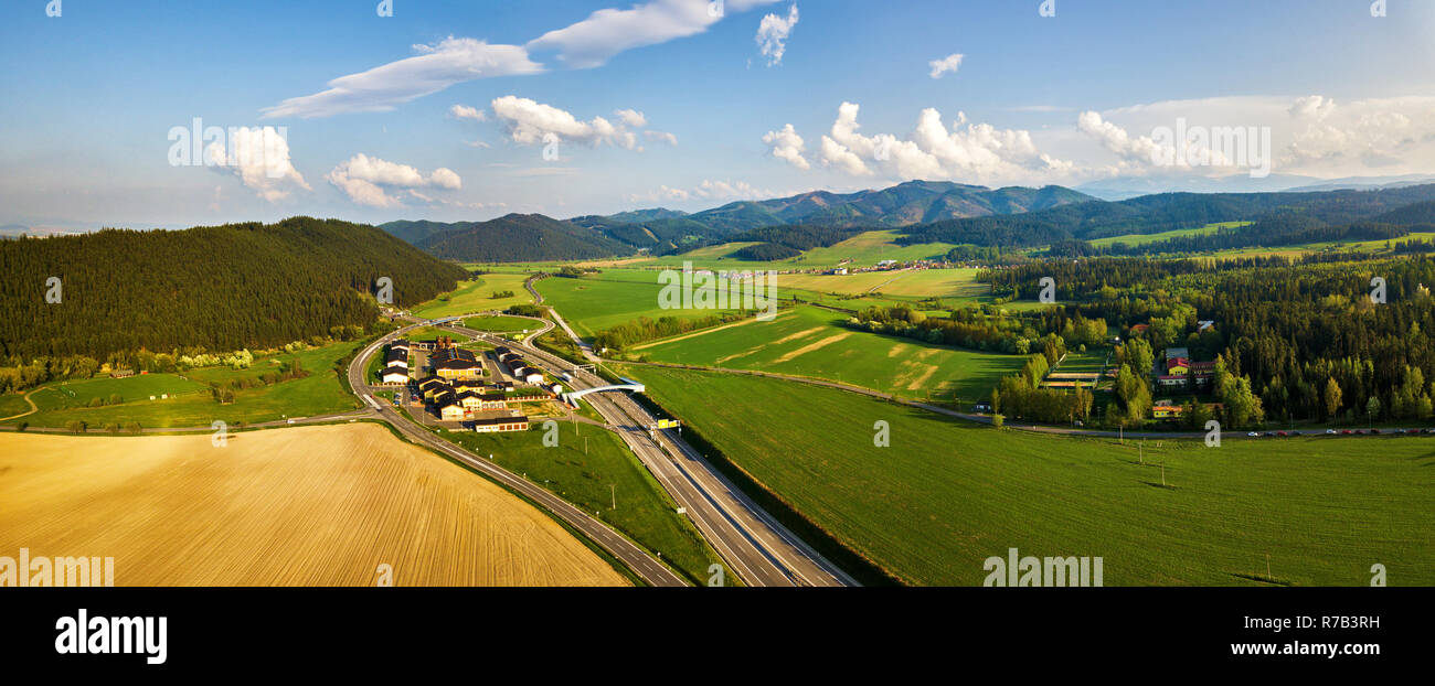 Autobahn and road junction in mountain valley Stock Photo - Alamy