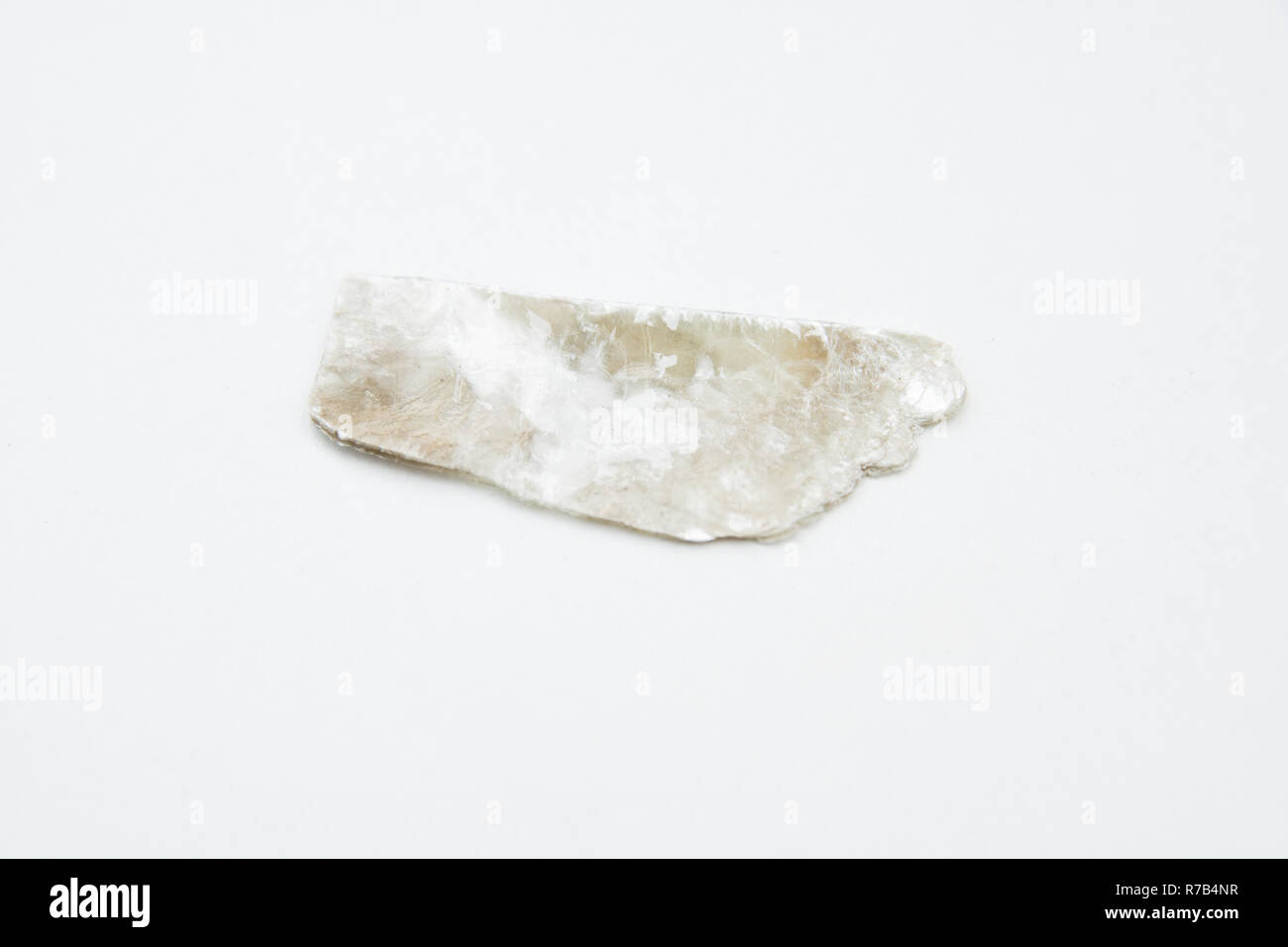 muscovite mineral isolated over white Stock Photo - Alamy