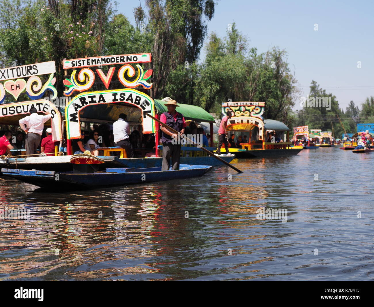 View to several mexican boats with tourists and gondoliers at great ...