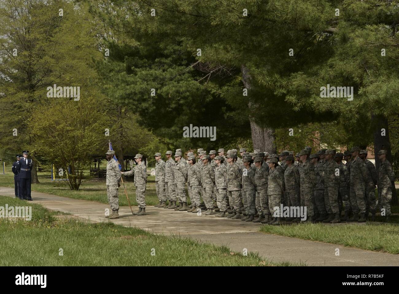 Airmen from the 32nd Intelligence Squadron stand in formation as the ...