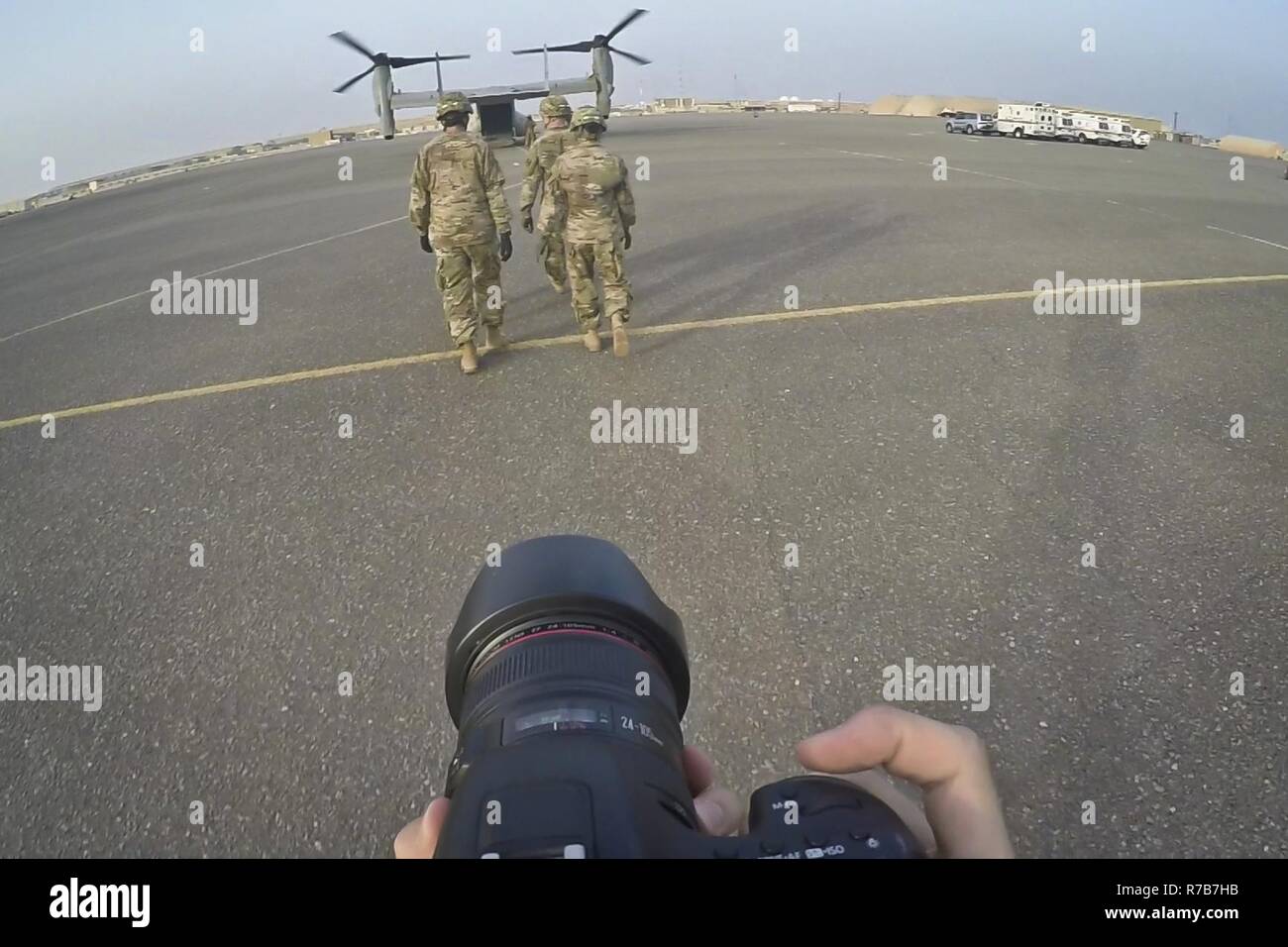 photographs combat medics, with the 86th Combat Support Hospital, as ...