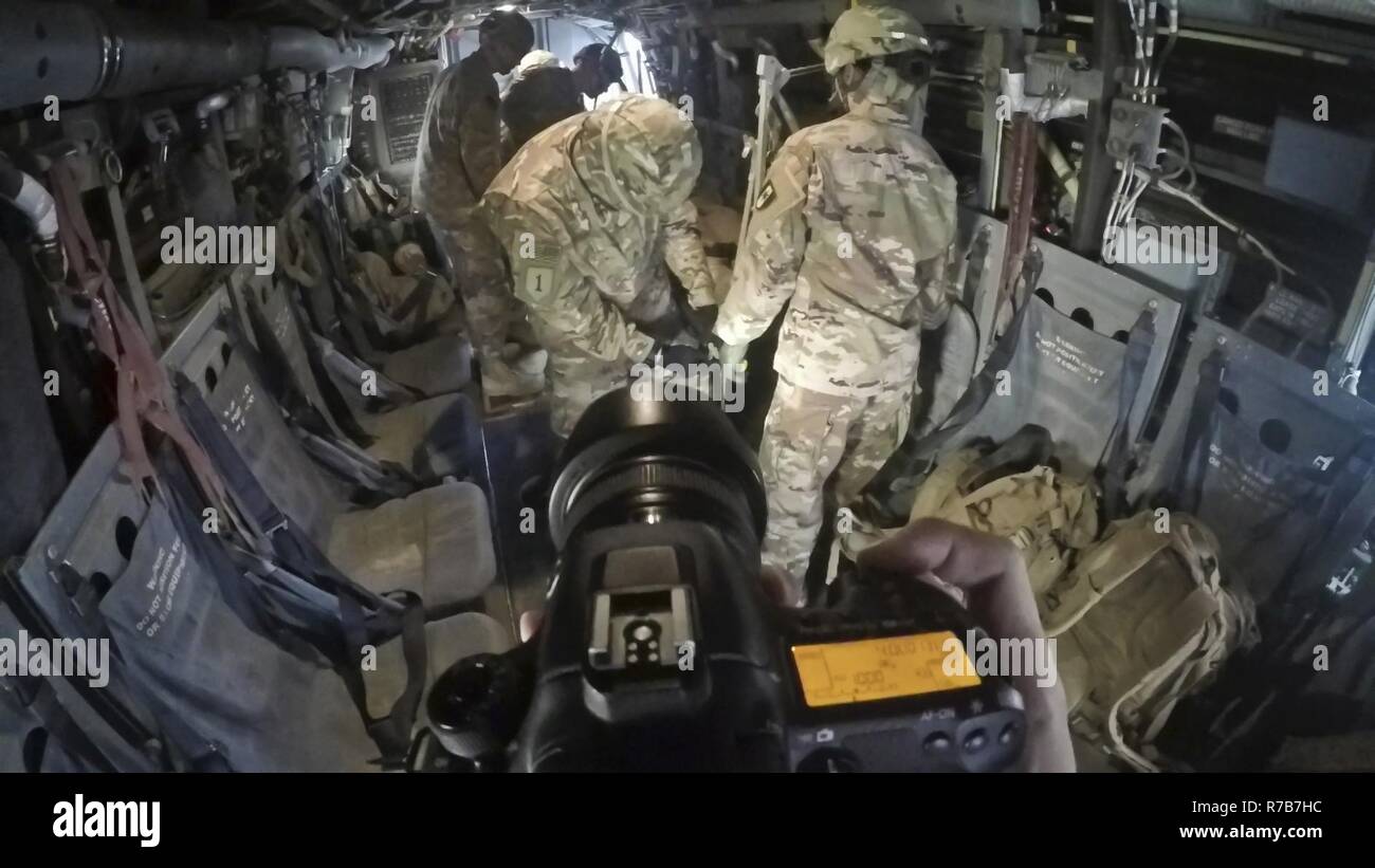 photographs combat medics, with the 86th Combat Support Hospital, as ...