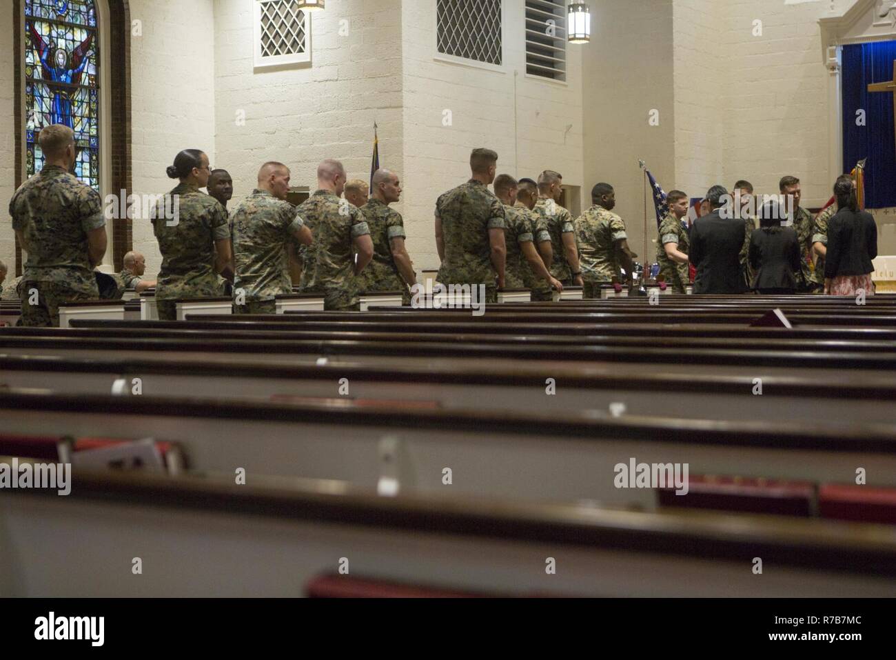 U.S. Marines gather to give their condolences to the family of 1st Lt ...