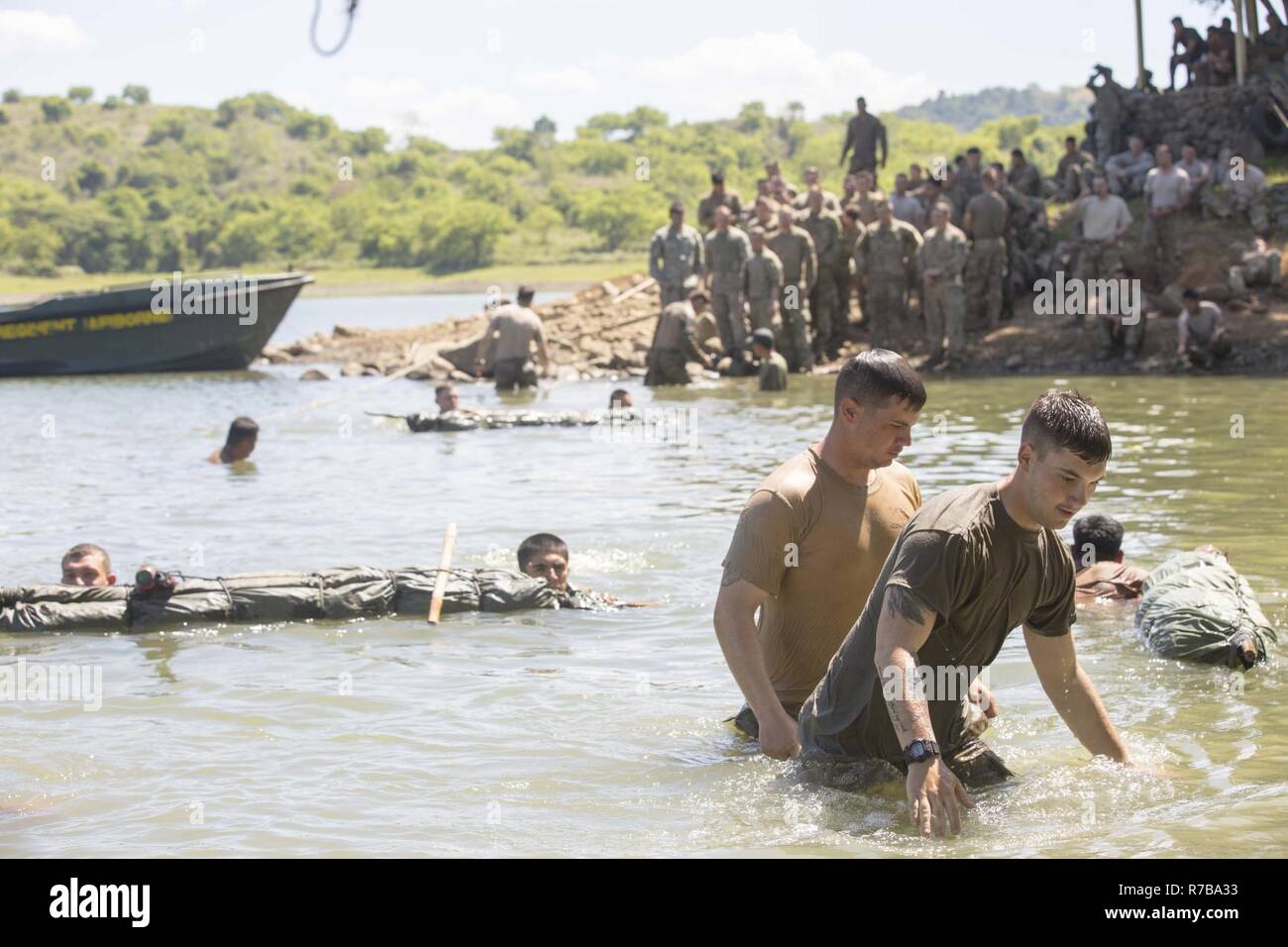 Philippine Special Forces demonstrate to U.S. Soldiers how to cross a ...