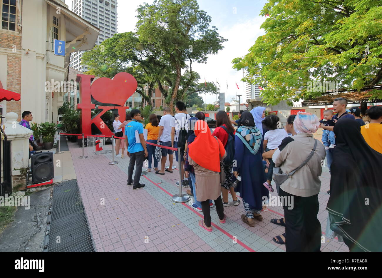 People queue to take photos with I love KL monument in Kuala Lumpur ...