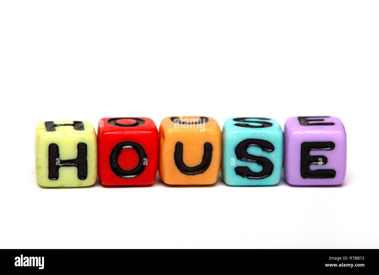 house - word made from multicolored child toy cubes with letters Stock ...