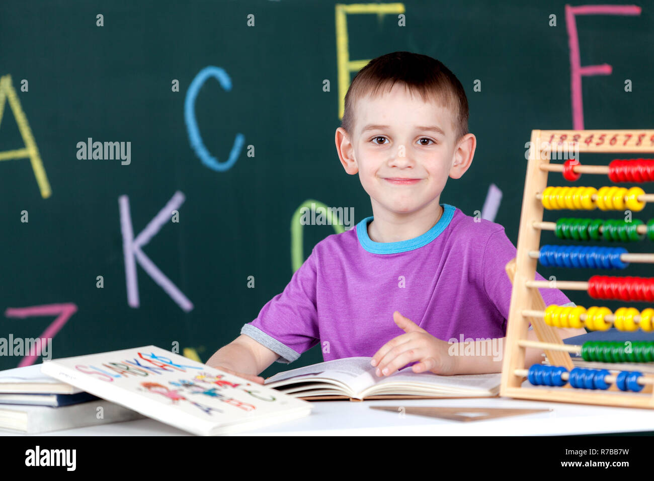 The boy goes to the first class at the school board Stock Photo - Alamy