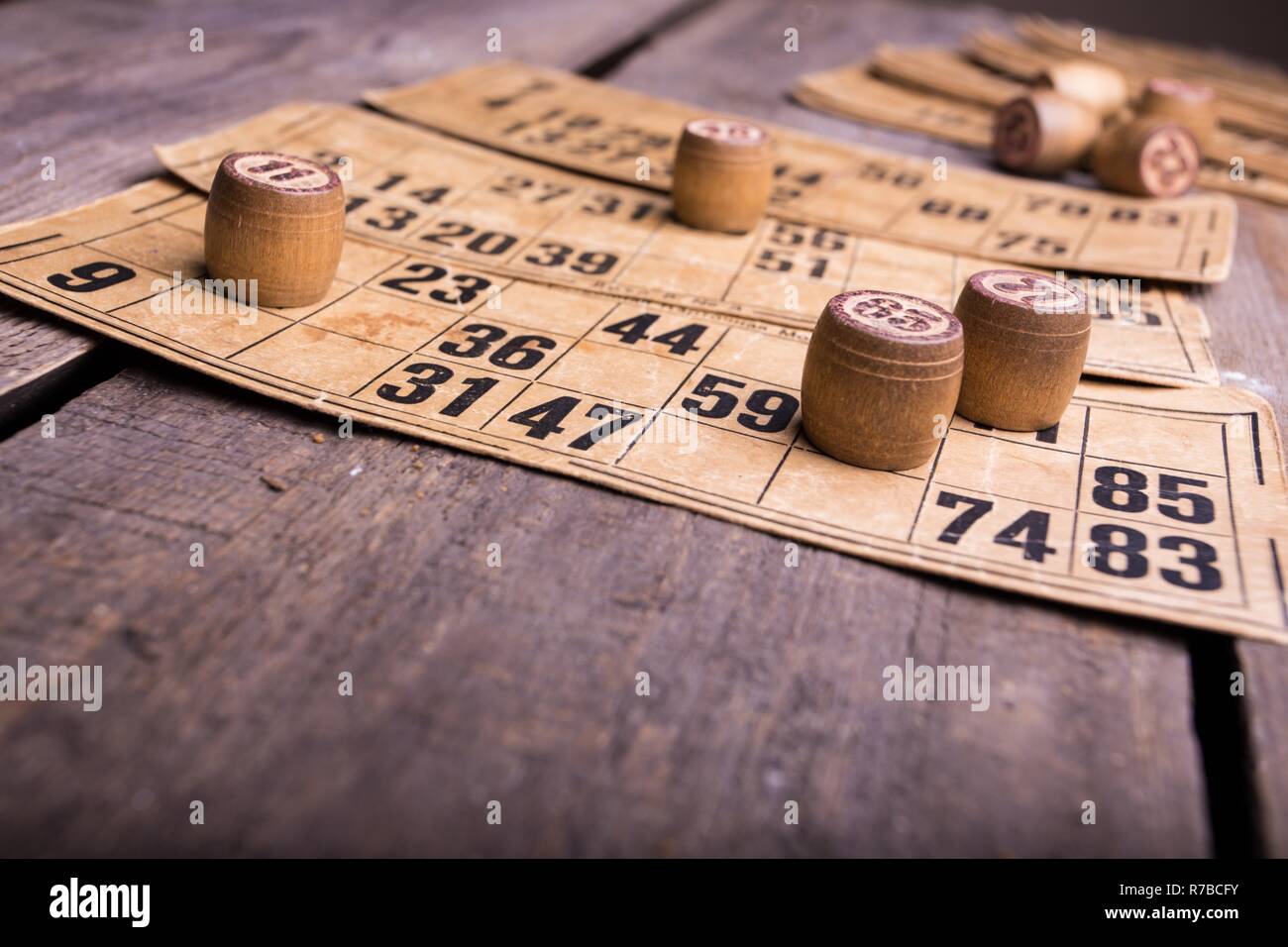 old wooden lotto barrels and game cards Stock Photo - Alamy