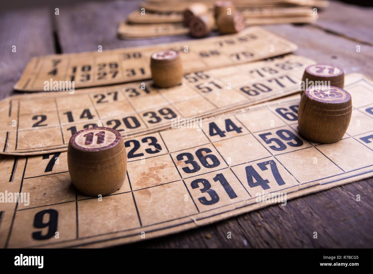 old wooden lotto barrels and game cards Stock Photo - Alamy
