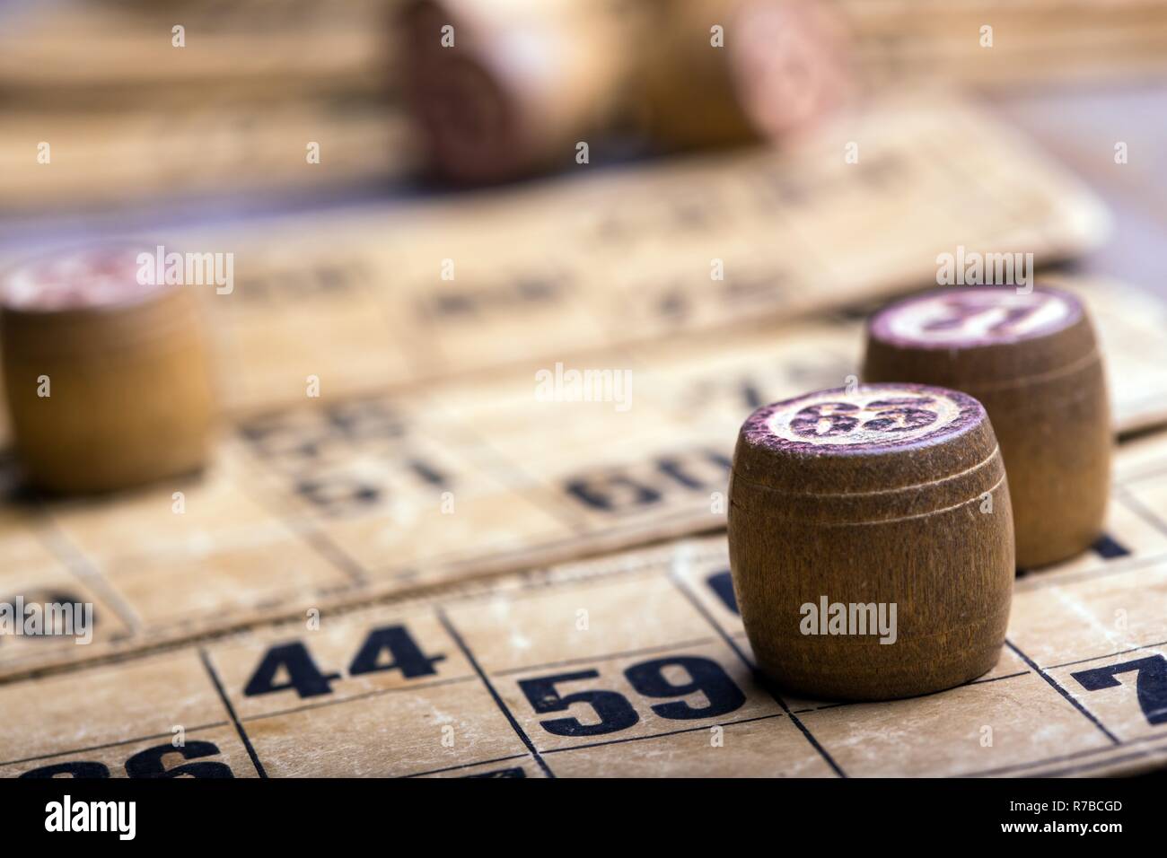 old wooden lotto barrels and game cards Stock Photo - Alamy